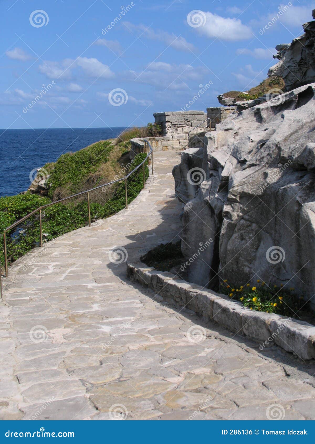 Stone walkway along coast stock photo. Image of natural - 286136