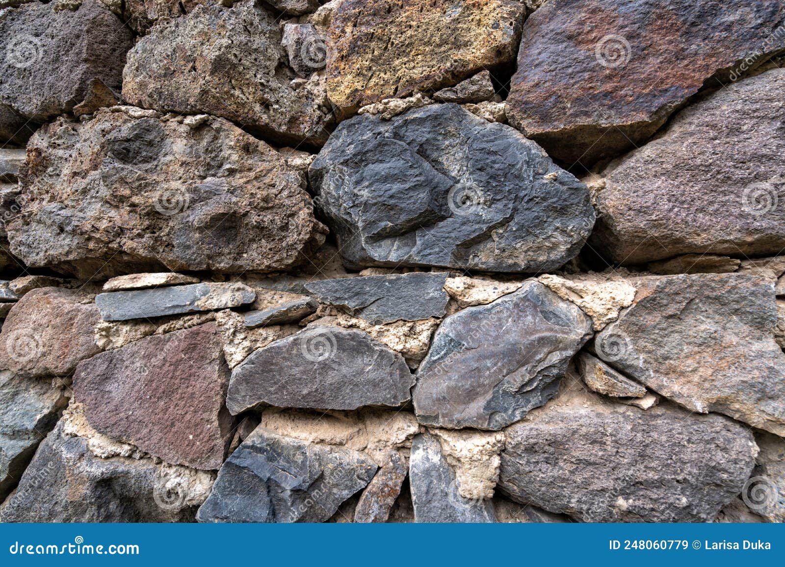 Stone Wall with Abstract Pattern Under Sunlight Stock Image - Image of ...