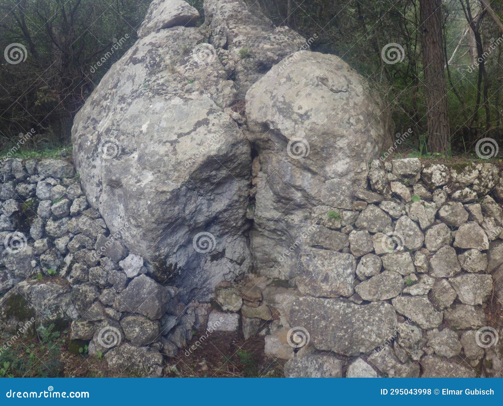 Stone wall around a garden stock photo. Image of accommodation - 295043998