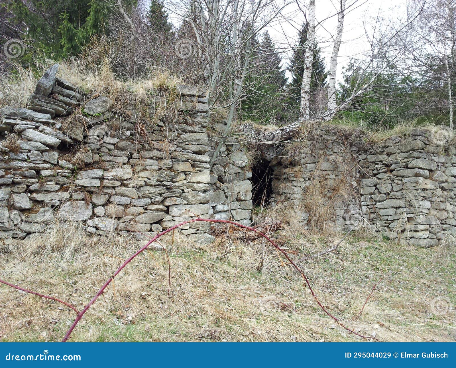 Stone wall around a garden stock image. Image of domicile - 295044029