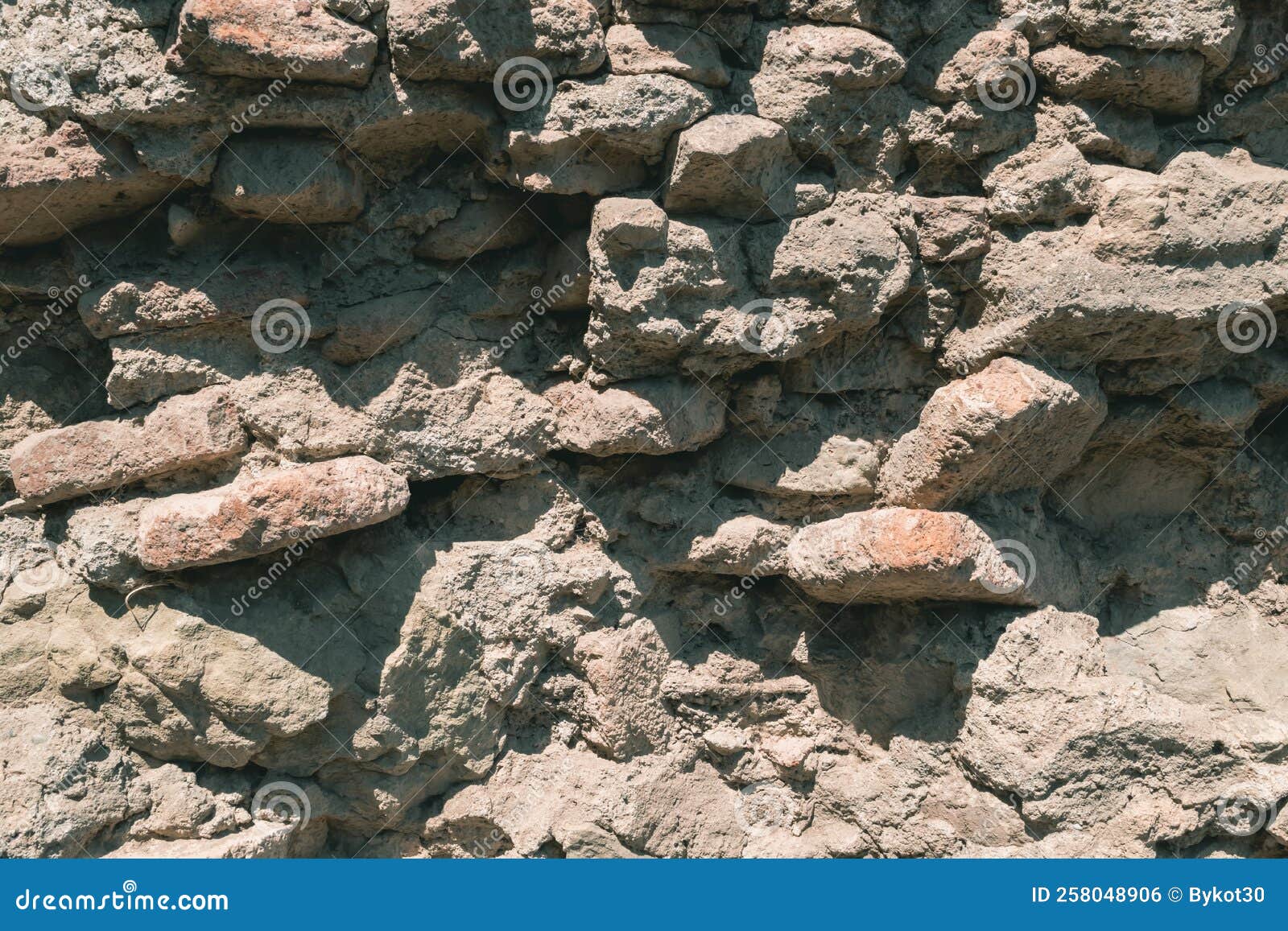 Stone Wall of an Ancient Building. Stone Background Stock Photo - Image ...
