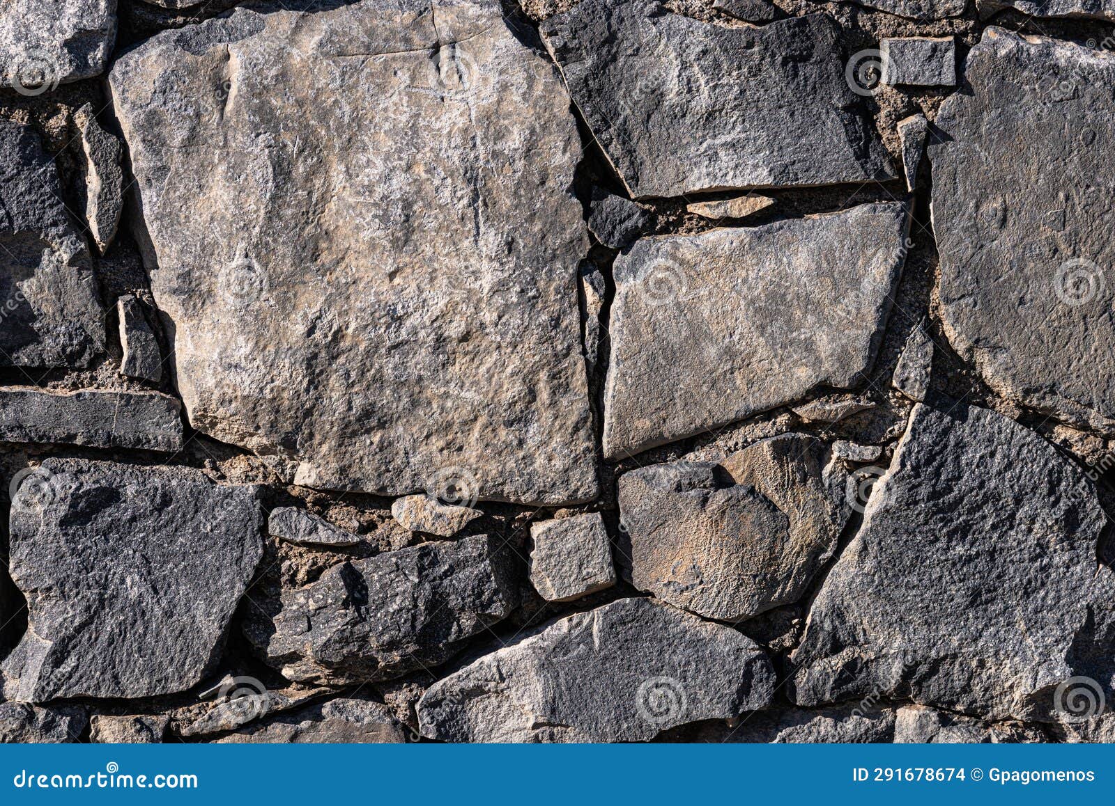 Stone Wall Built with Grunge Relief Granite Rock. Stock Photo - Image ...
