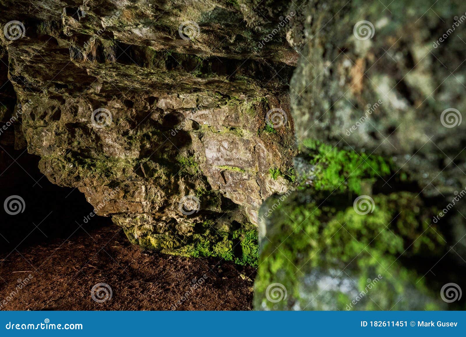 Stone wall in a cave, stock image. Image of inside, mysterious - 182611451