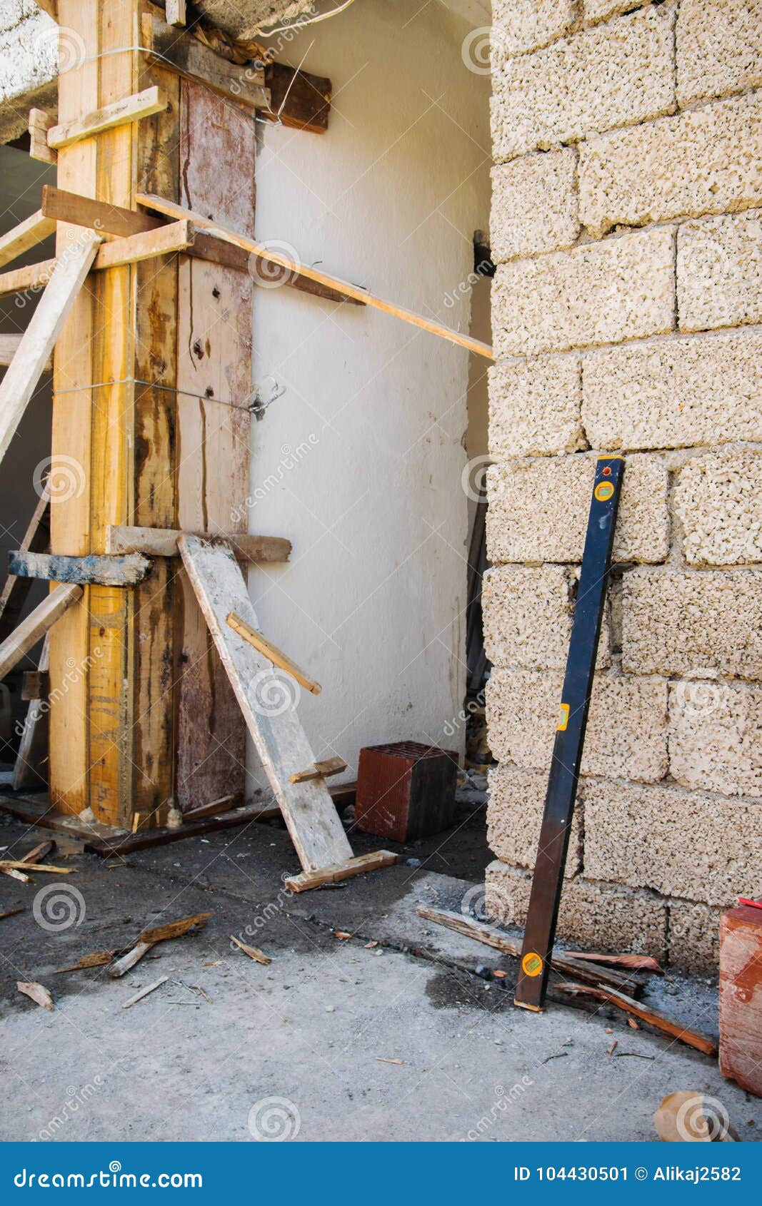 Stone wall construction stock image. Image of wall, tool - 104430501