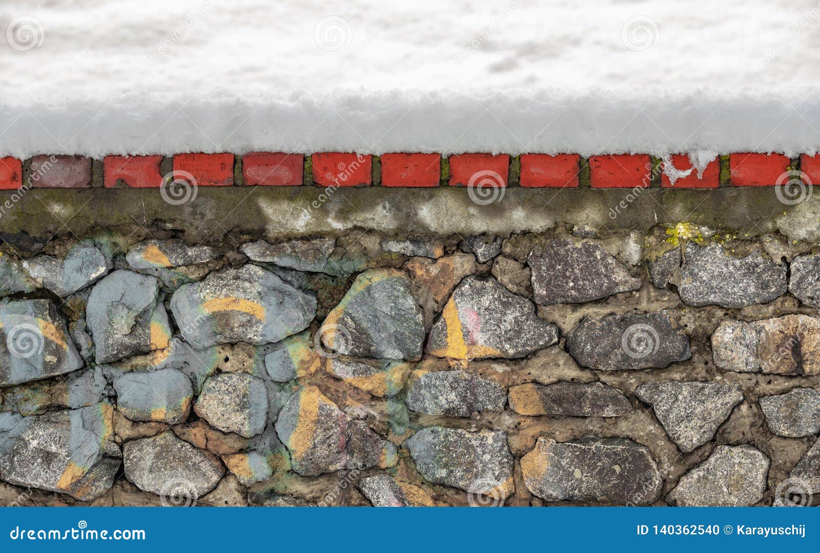 Stone wall covered by snow stock photo. Image of architecture - 140362540