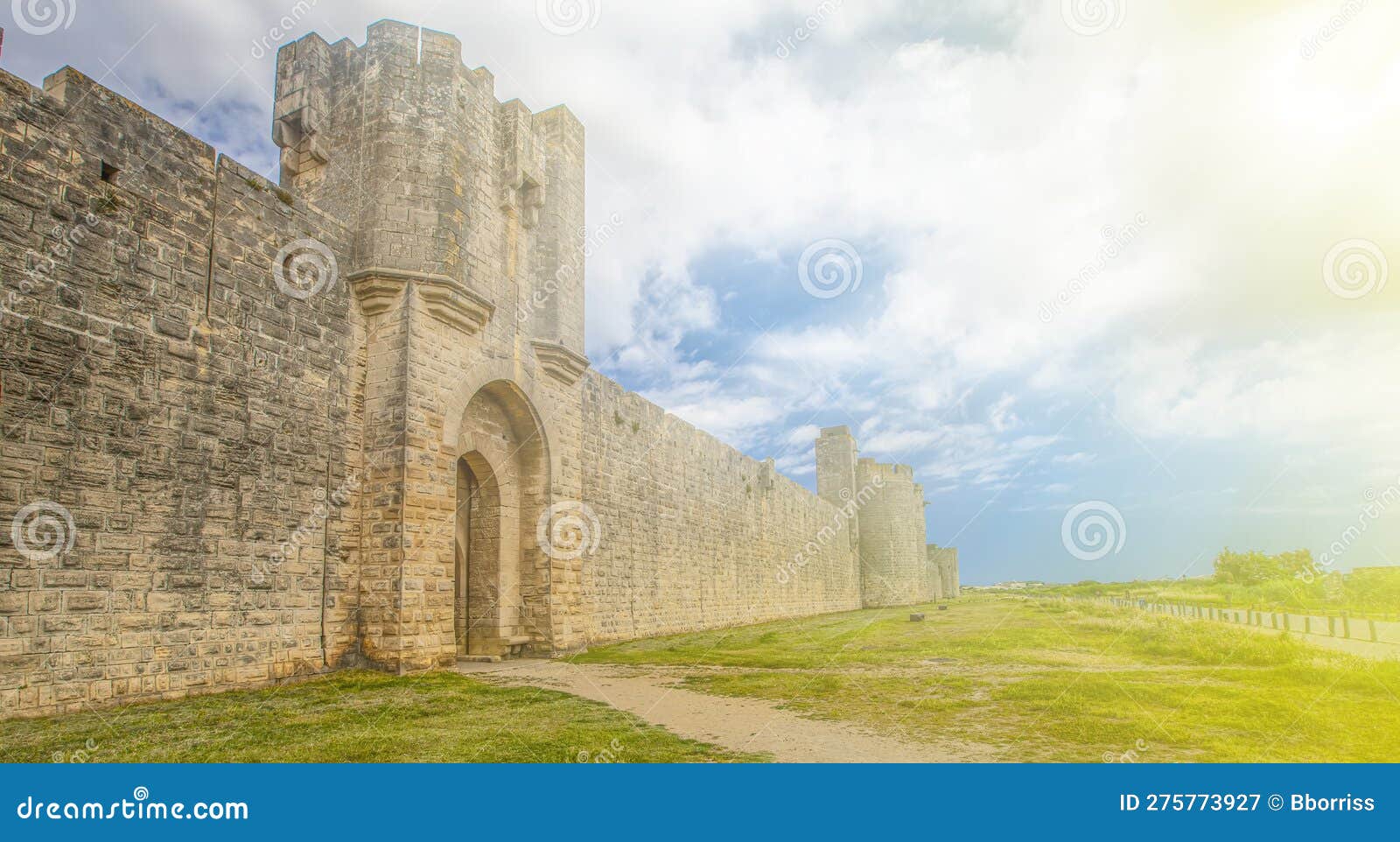 Stone Wall of European Castle with Gate in Soft Sunlight Stock Image ...