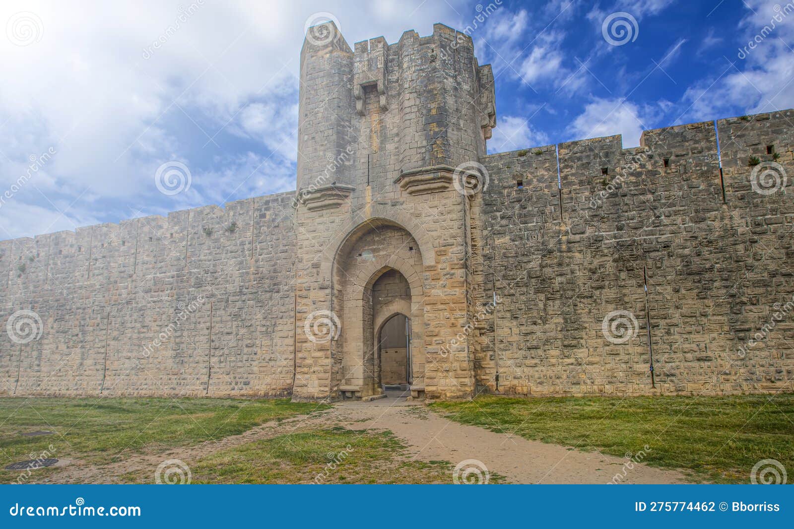 Stone Wall of European Castle with Gate in Soft Sunlight Stock Photo ...
