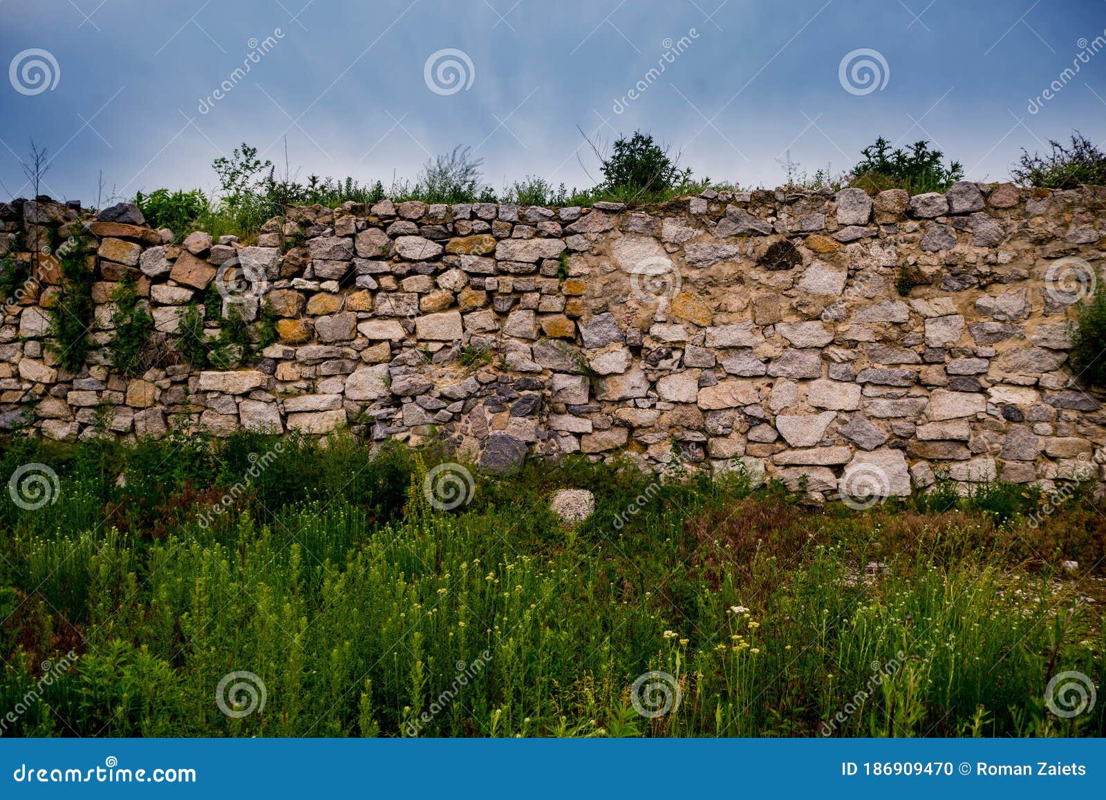 Stone Wall in a Field. Beautiful Background. Stock Photo - Image of ...