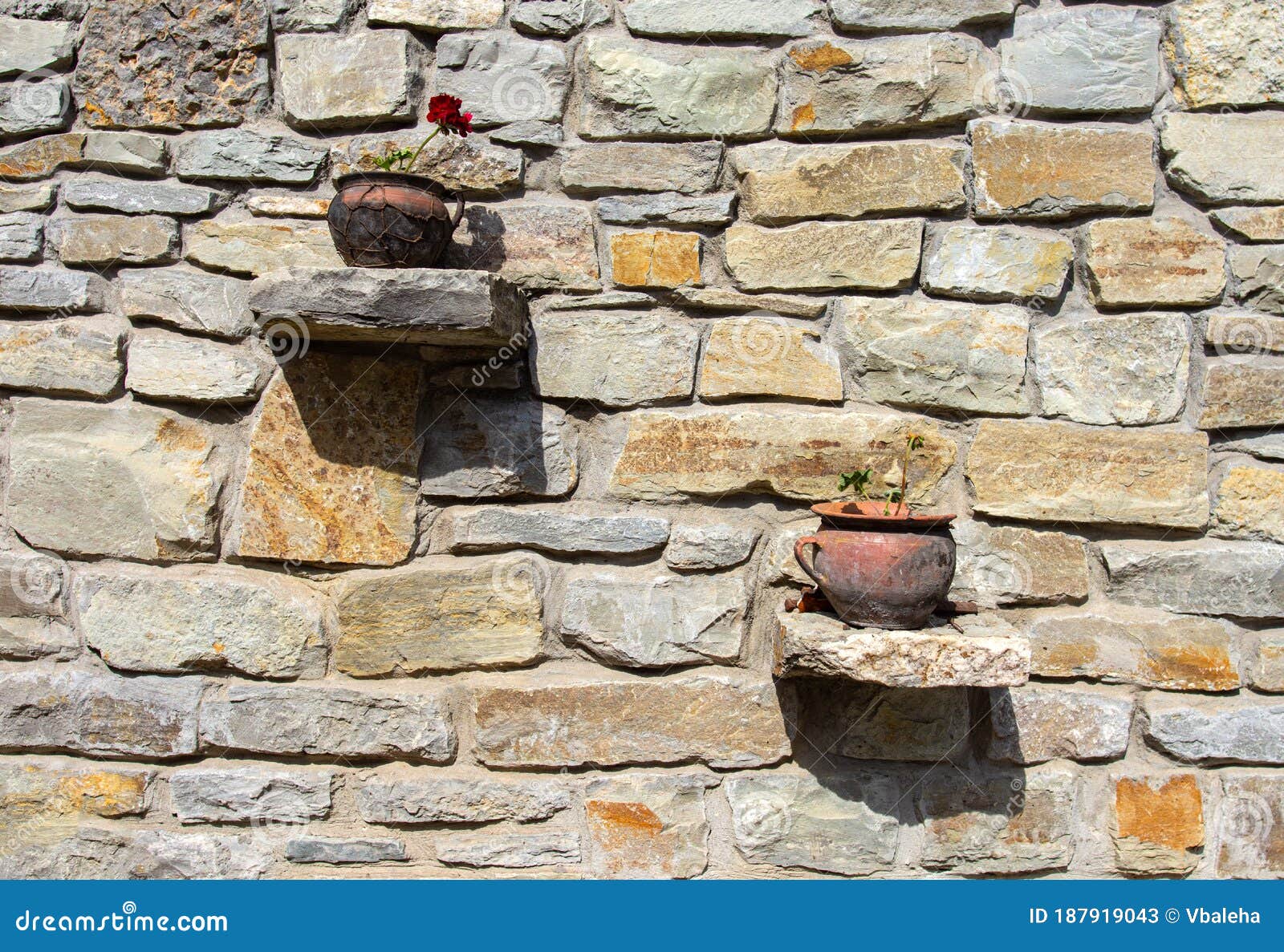 Stone Wall with Flower Pots Stock Image - Image of blossom, gardening ...