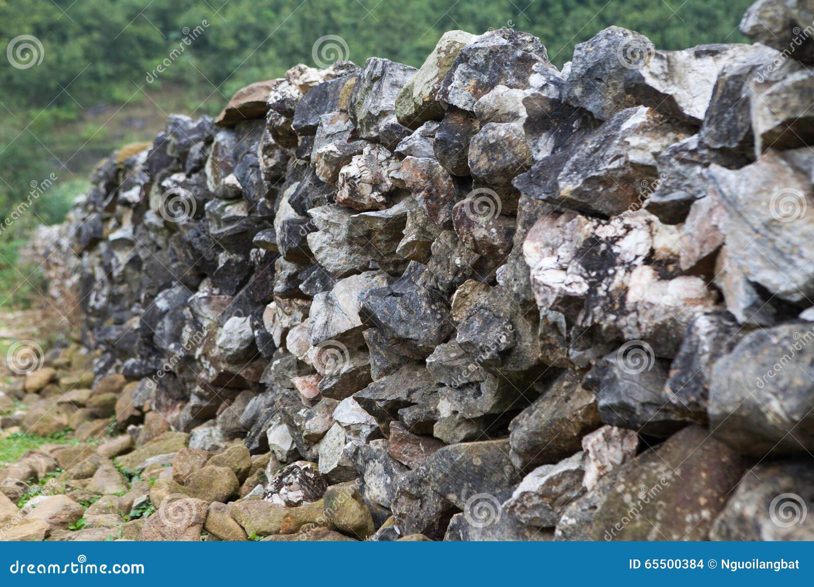 Stone wall on a hill stock photo. Image of granite, handcraft - 65500384