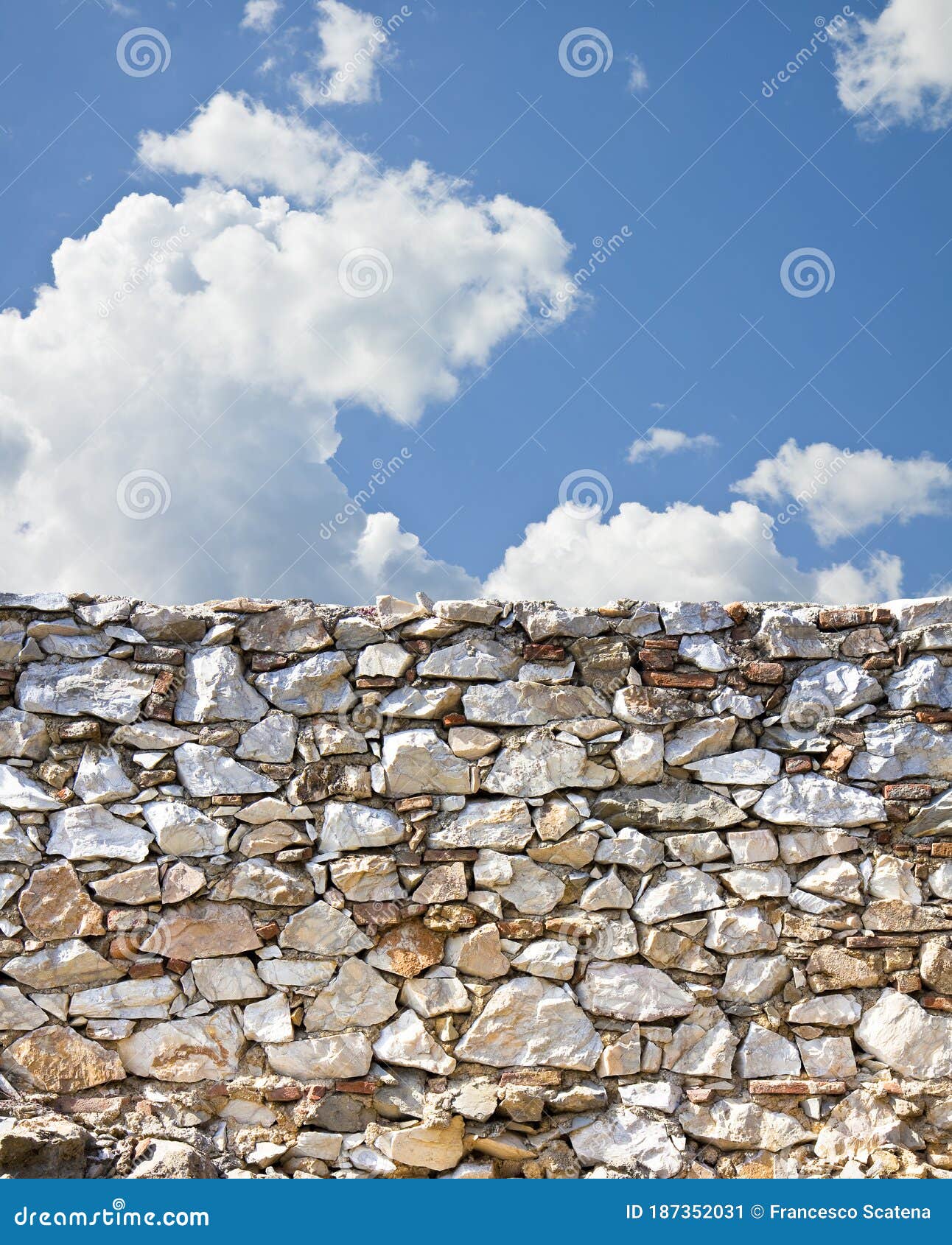 Stone Wall with Large Stone Blocks Against a Sky Background - Image ...