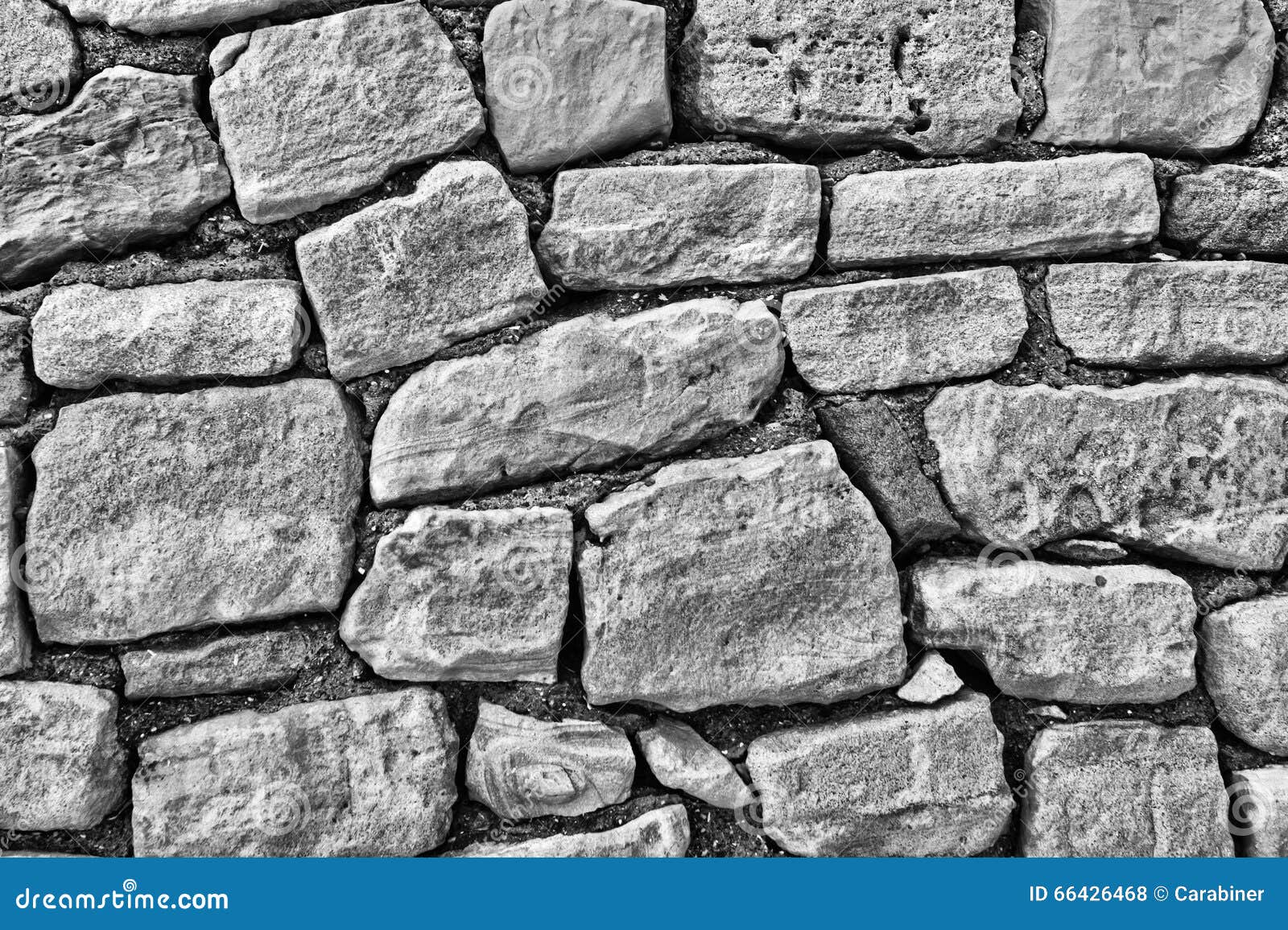 Stone wall of large stones stock photo. Image of pattern - 66426468