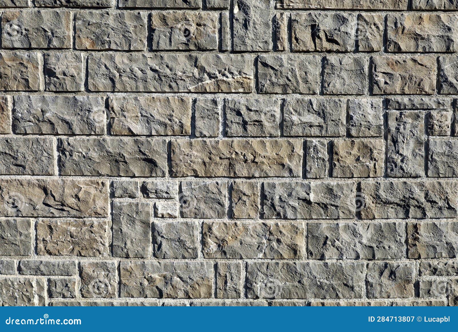 Stone Wall Made of Square and Rectangle Rough Granite Blocks. Stock ...