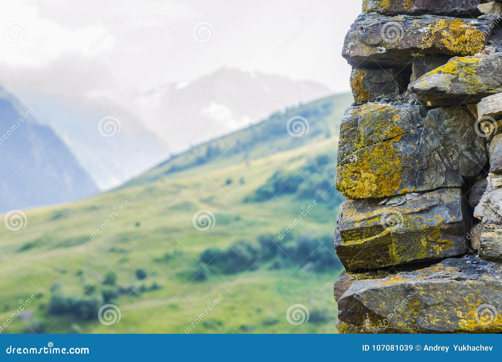 Stone Wall with Mountains in the Background Stock Image - Image of ...