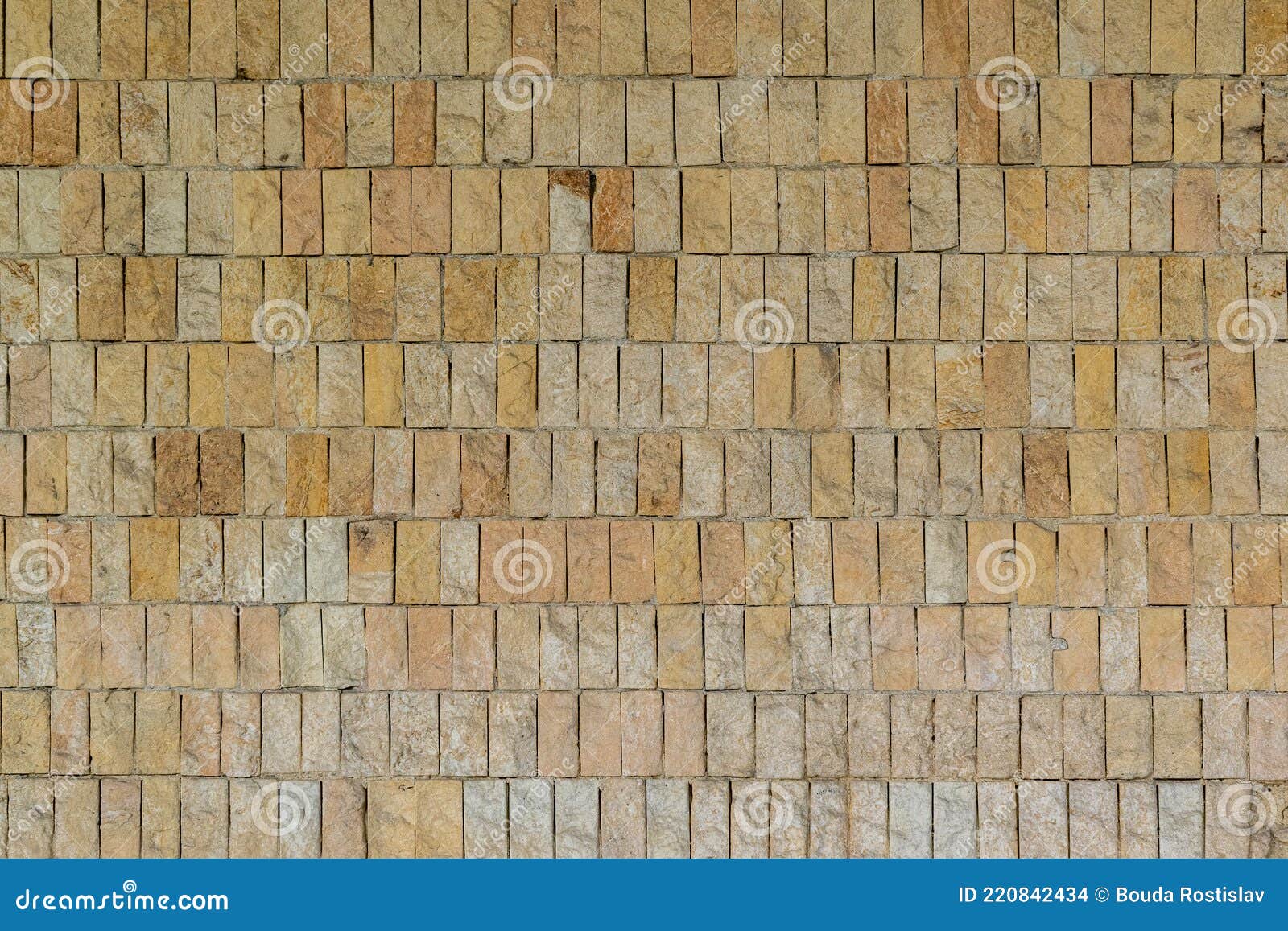 Stone Wall of Natural Stones in Different Sizes. the Facade of the ...