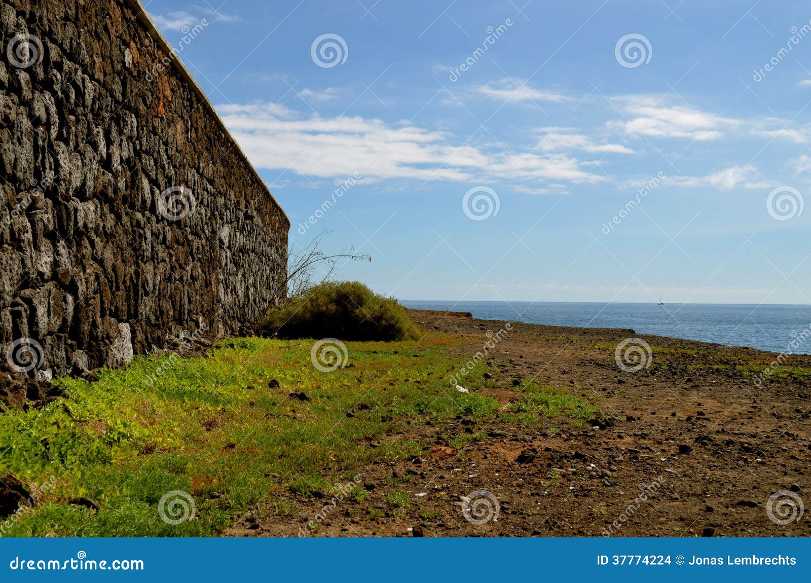 Stone wall stock photo. Image of ocean, protection, volcanic - 37774224