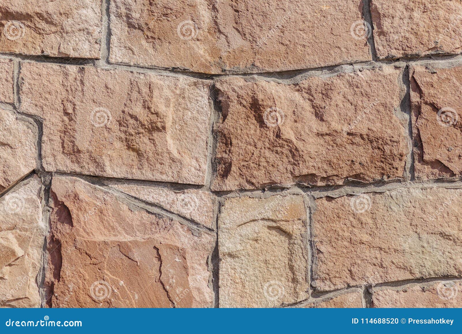 Stone wall in red colour stock photo. Image of exterior - 114688520