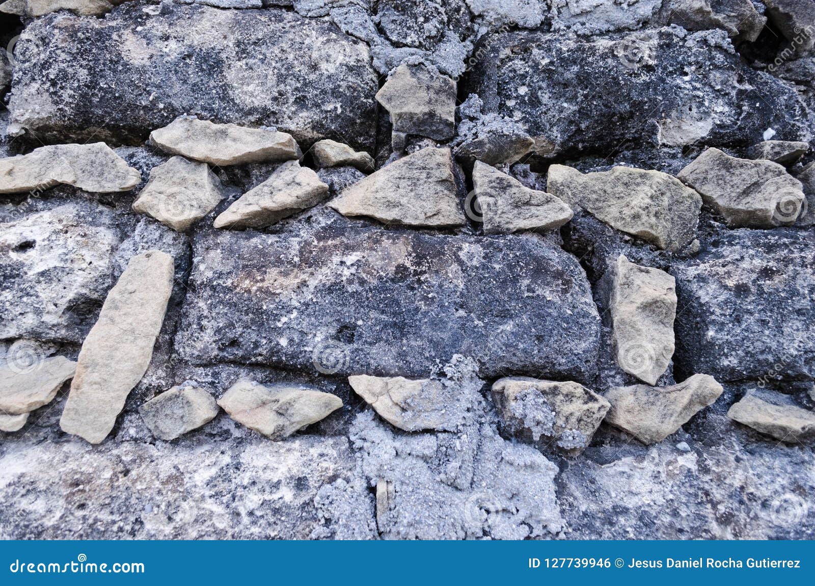 Stone Wall, Small Stones Forming Square Bricks. Stock Photo - Image of ...