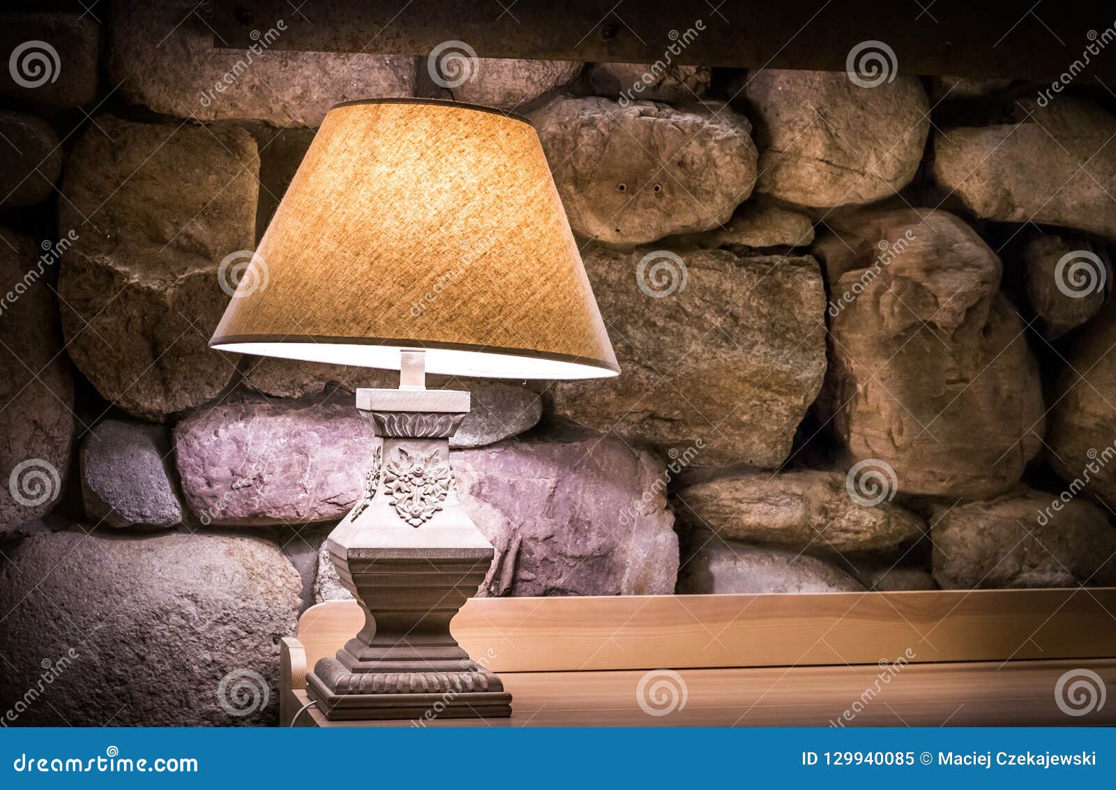 Stone Wall and Stylish Lamp Stock Image - Image of lamp, grunge: 129940085
