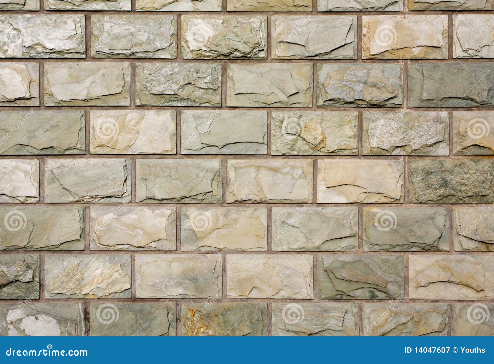 Stone Wall Cladding Made Of Horizontal Gray Brown And