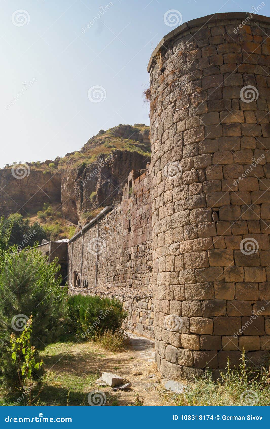 Stone wall with a tower. stock photo. Image of outside - 108318174