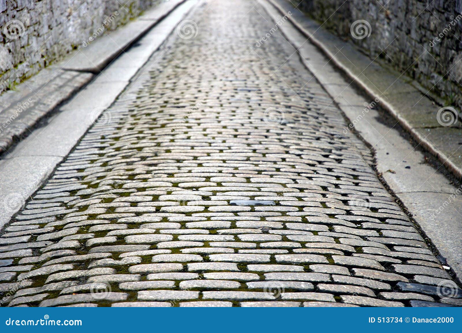 Stone Walled Cobbled Street Stock Photo - Image of curb, walls: 513734