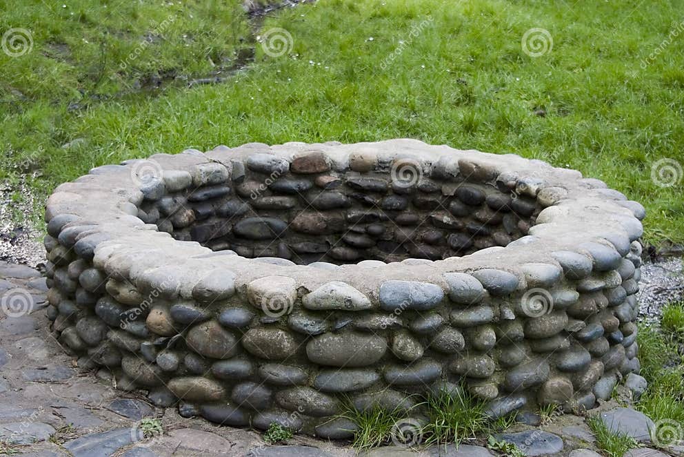 Stone Well stock photo. Image of grass, lawn, rocks, stone - 806914
