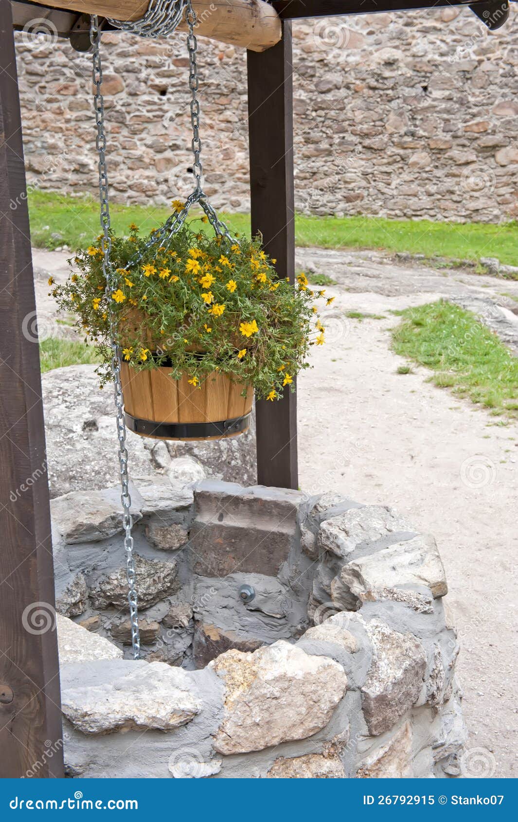 Stone well with flowers stock image. Image of travel - 26792915