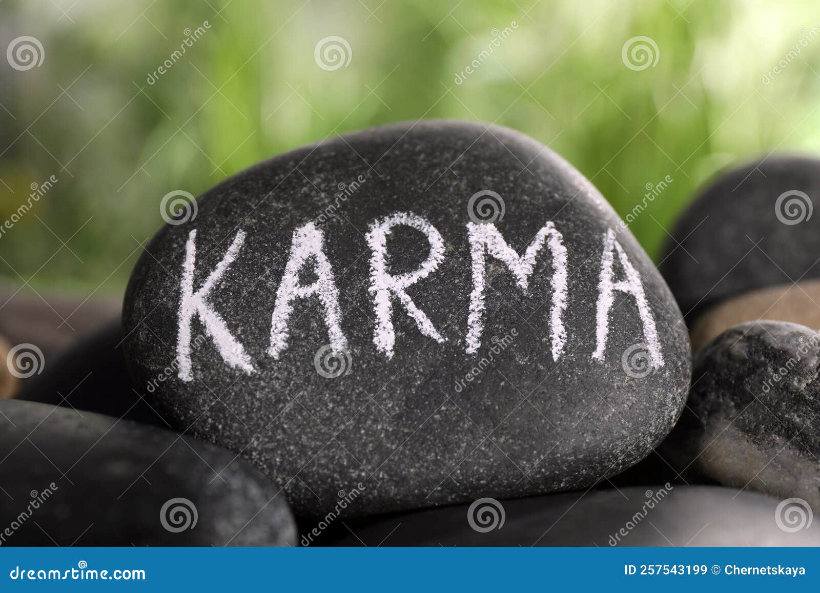 Stone with Word Karma on Blurred Background, Closeup Stock Image ...