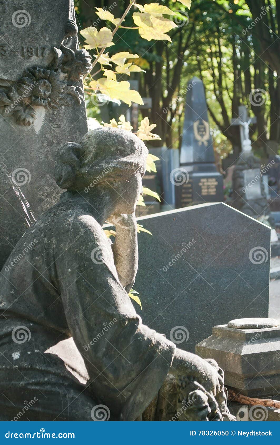 Stoned angel in cemetery stock photo. Image of garden - 78326050