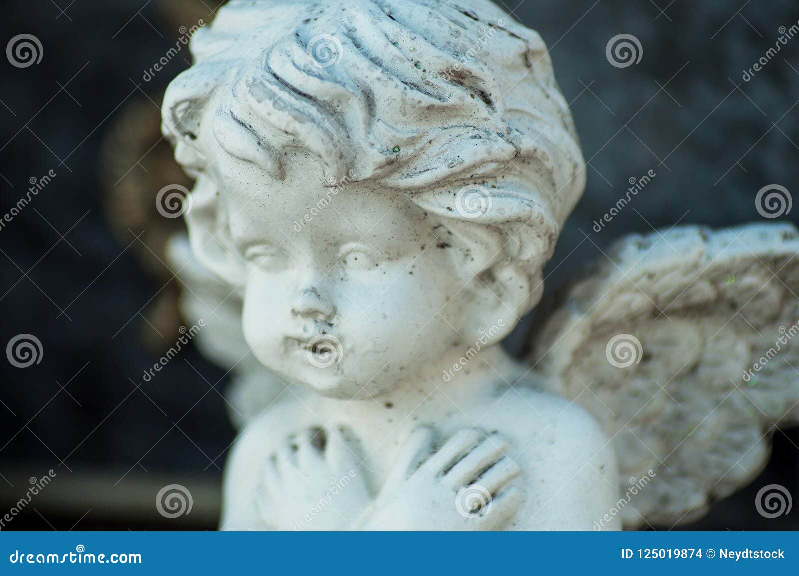 Stoned Angel On Tomb In Cemetery Stock Image | CartoonDealer.com #113521567