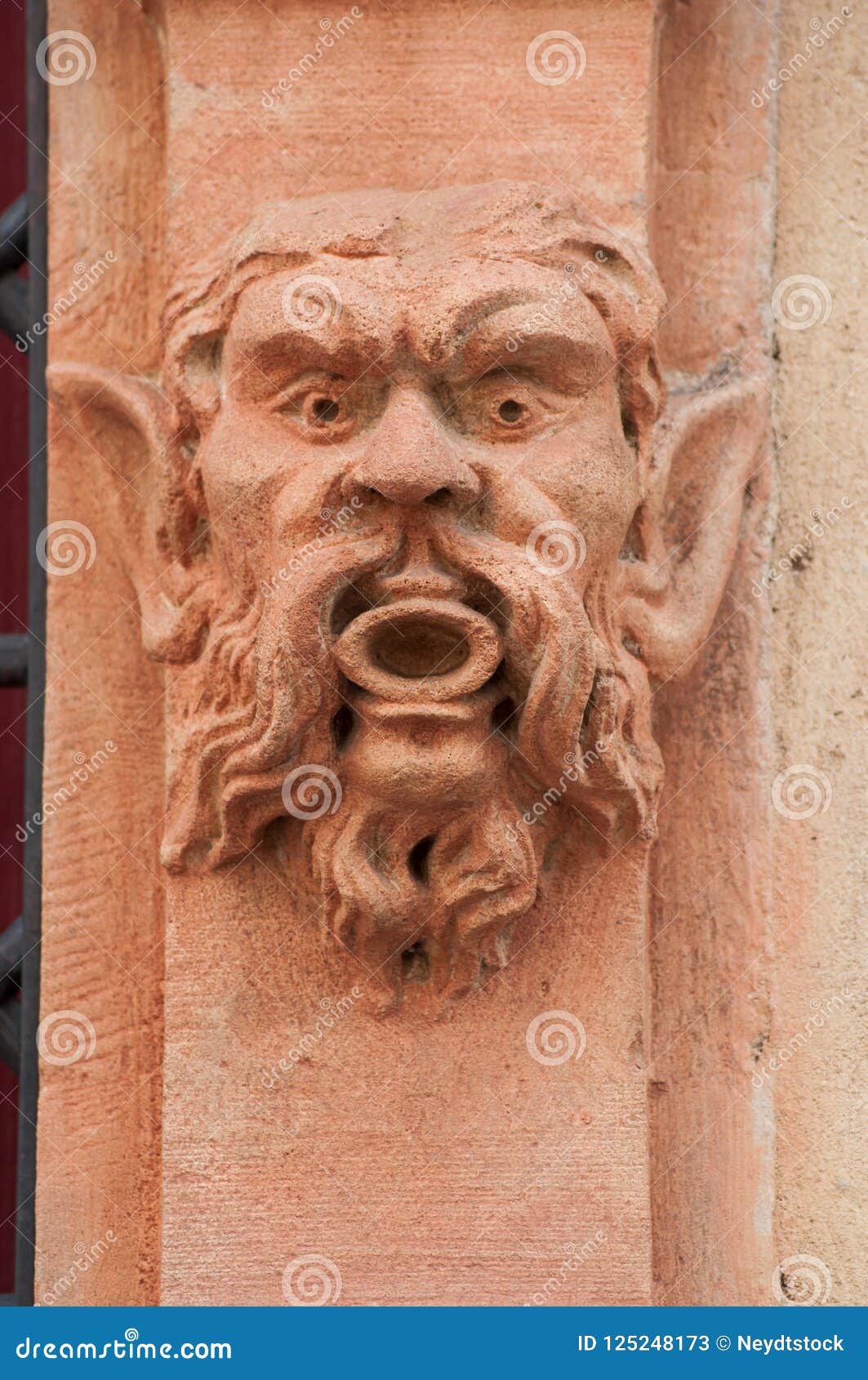 Stoned Head on Building Facade Stock Image - Image of house, closeup ...