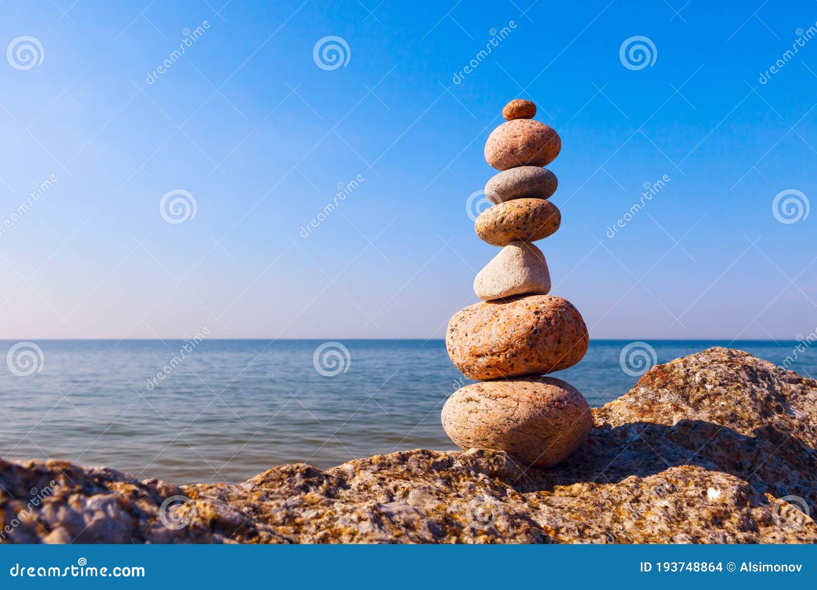 Stones Balance on the Edge of a Cliff. Concept of Balance and Harmony ...
