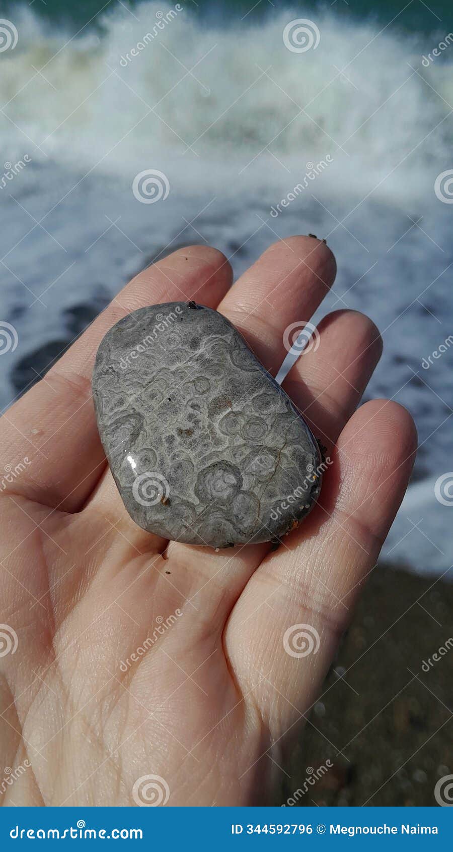 Stones beach day stock photo. Image of hand, stones - 344592796