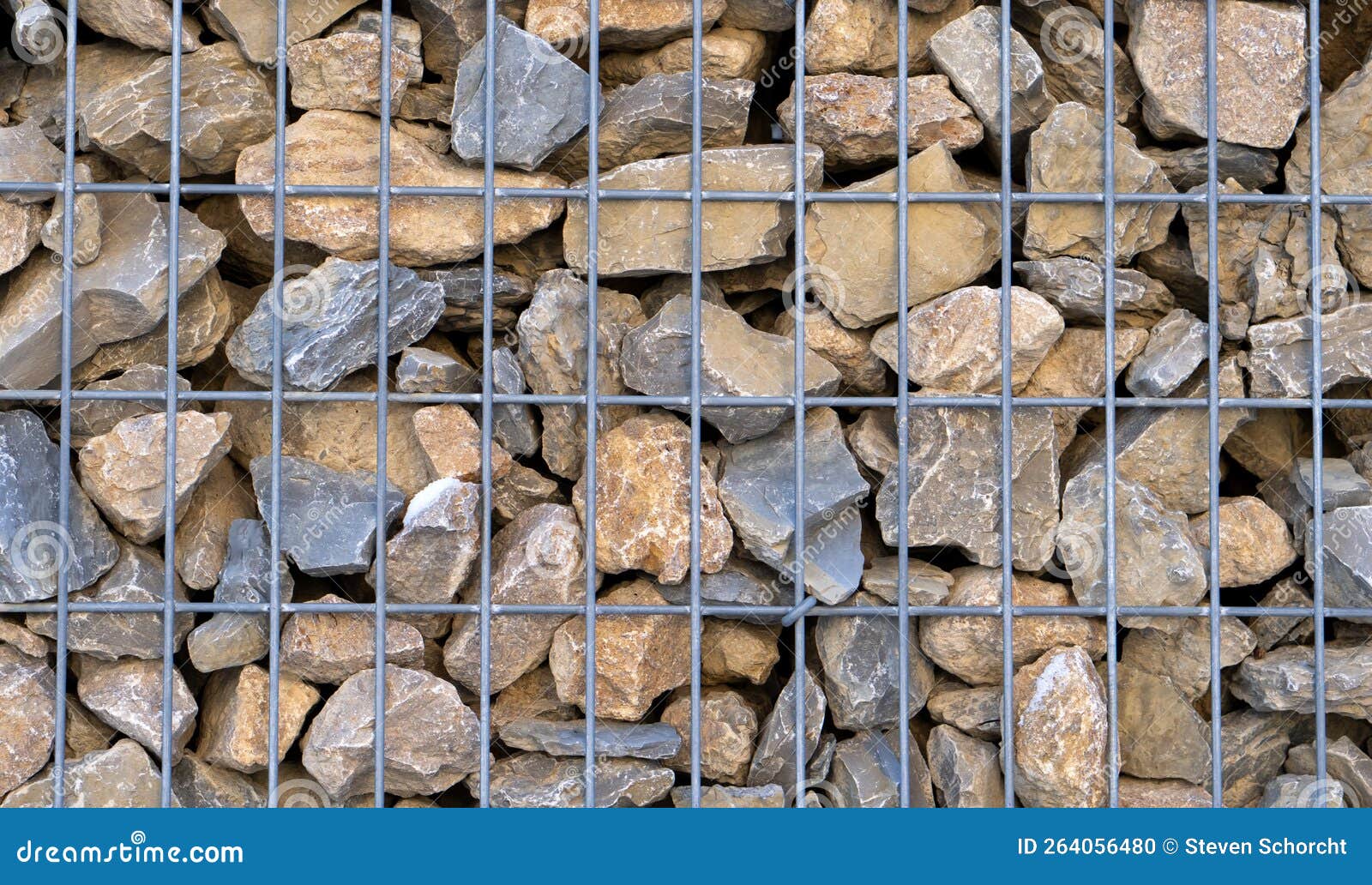 Stones behind bars stock photo. Image of brickwork, geology - 264056480