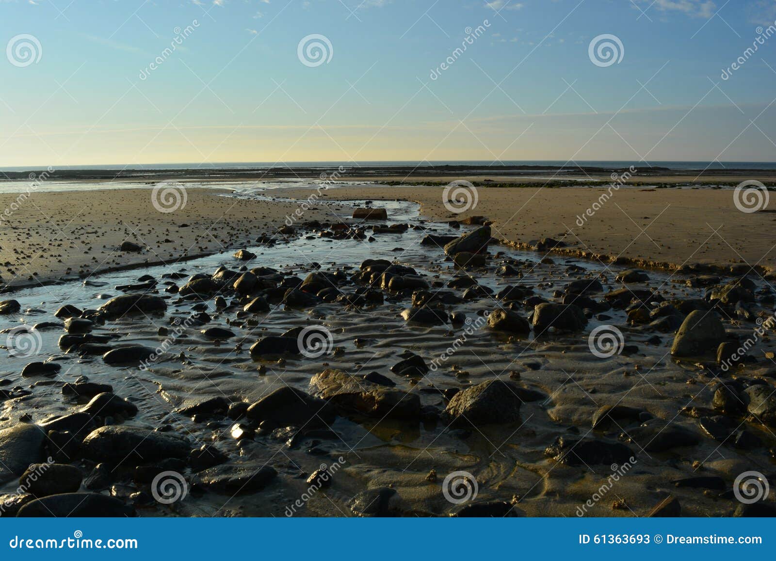 The stones block the water stock image. Image of beach - 61363693