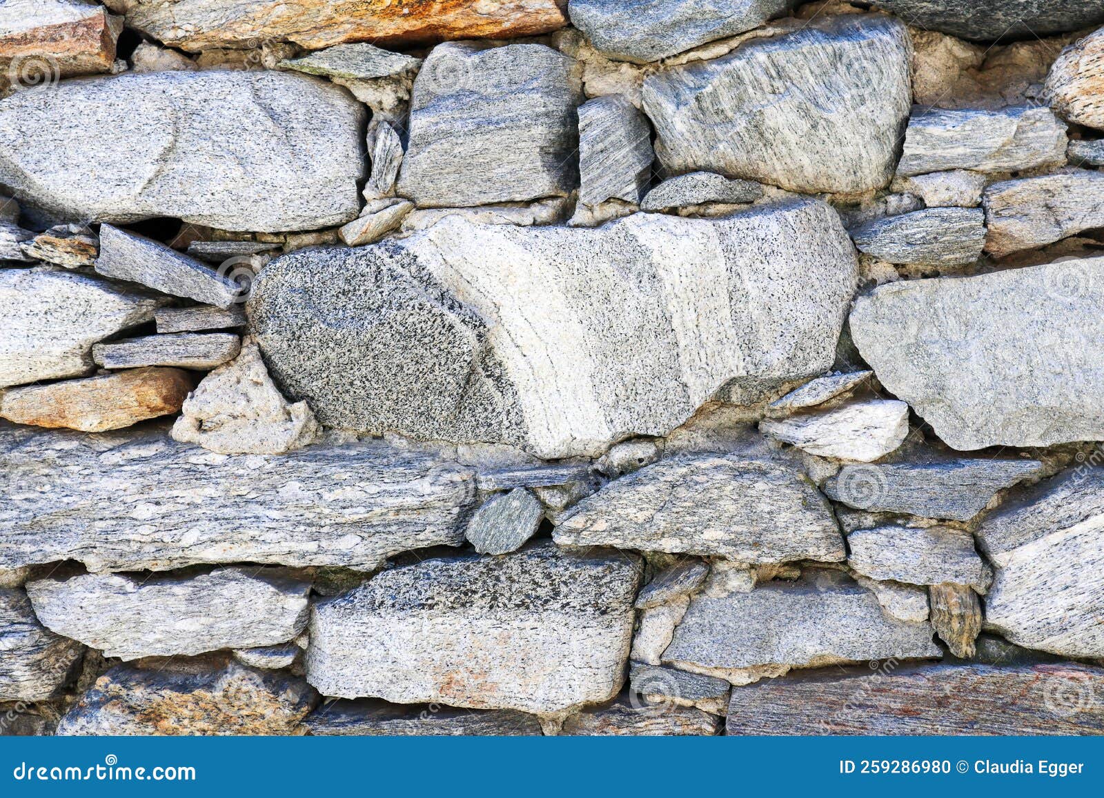 Stones and Bricks in a Wall Stock Photo - Image of brick, stone: 259286980