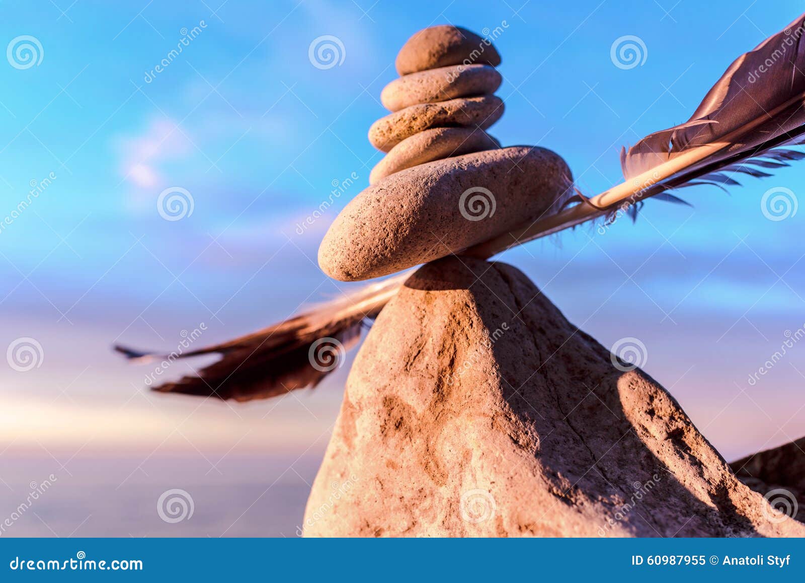 Stones and feather stock image. Image of harmony, identity - 60987955