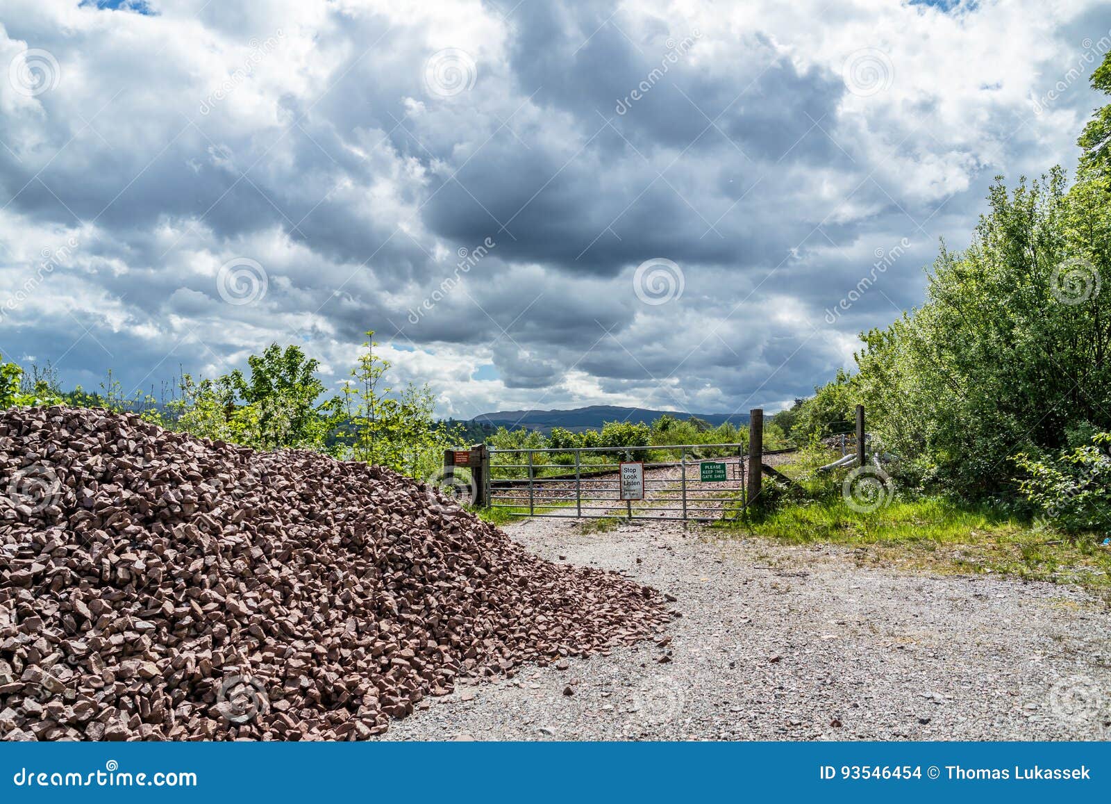 Stones in Front of Gate To the Trainn Tracks Stock Photo - Image of ...