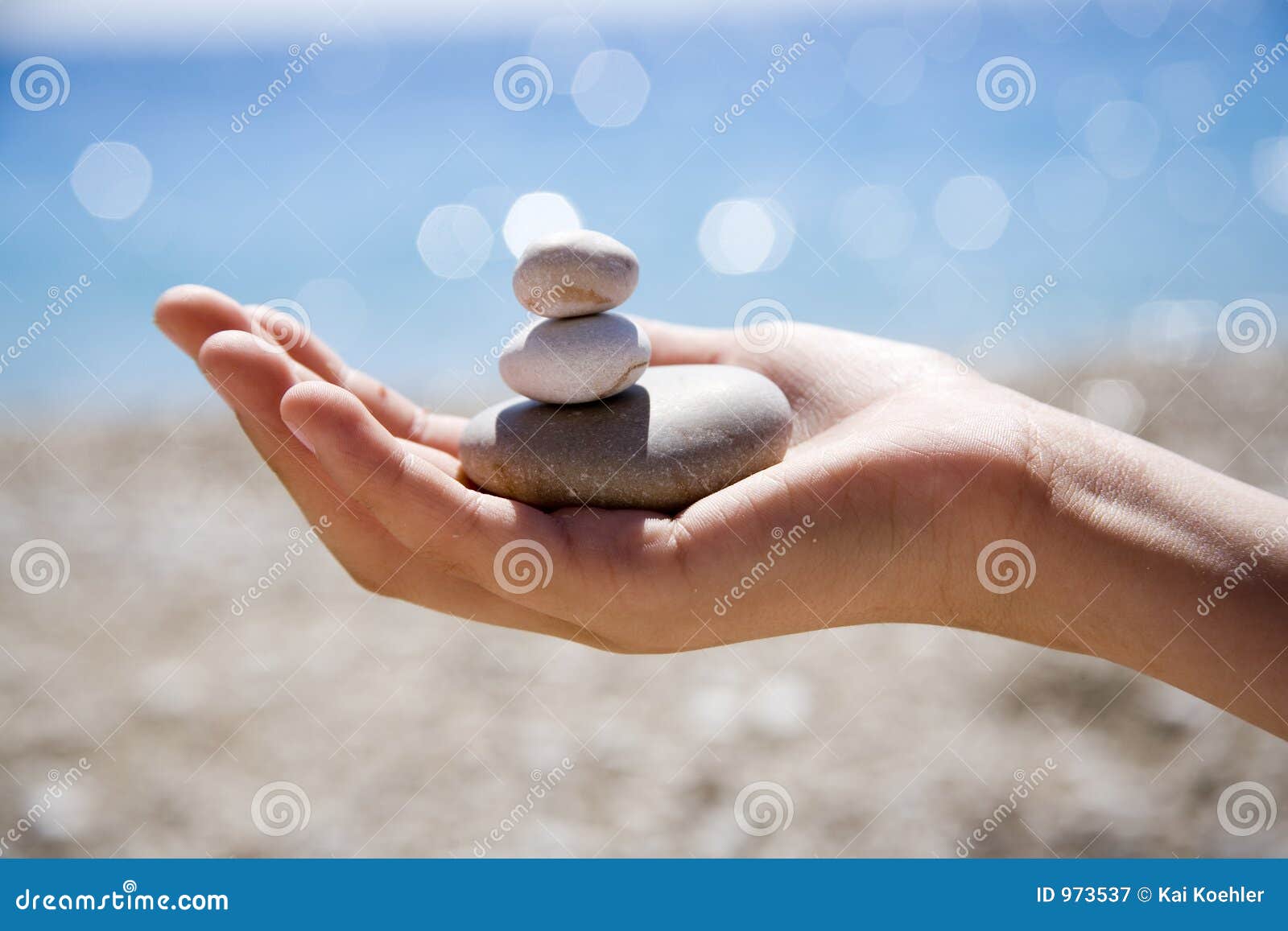 Stones in the hand stock image. Image of warm, sunlight - 973537