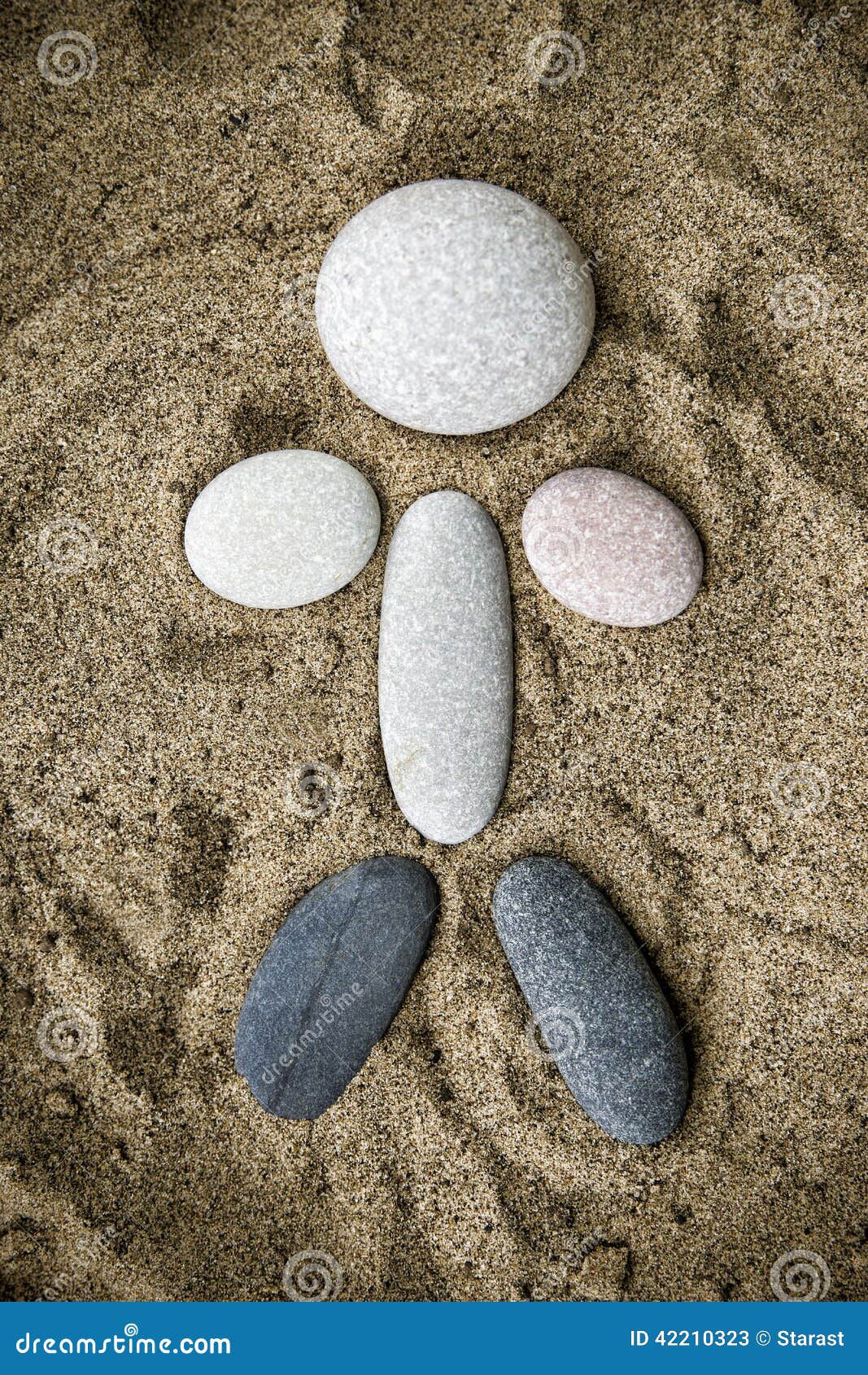 Stones in Human Form Closeup in the Sand Stock Image - Image of black ...