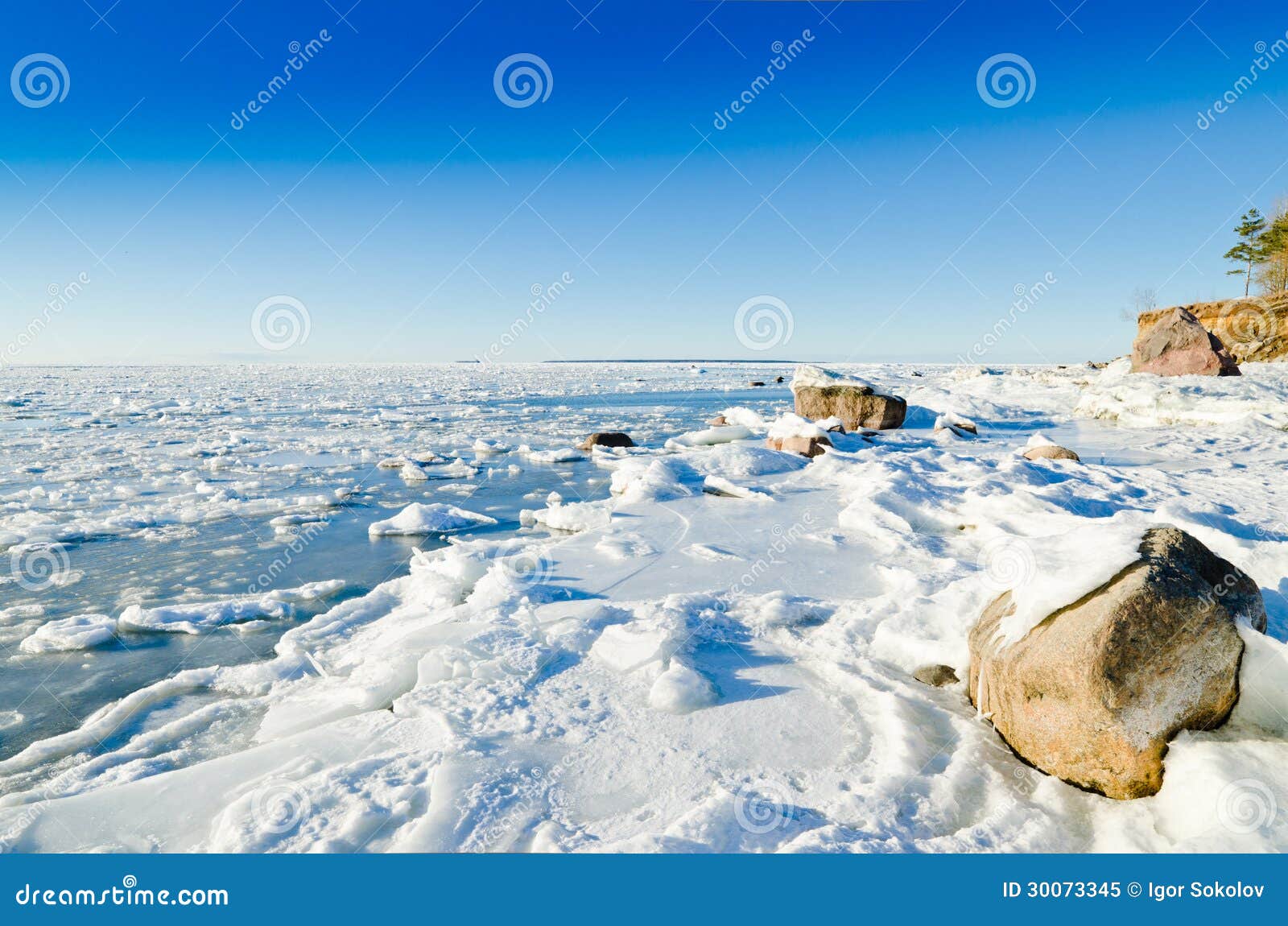 Stones in Ice on the Baltic Sea Coast Stock Image - Image of cloud ...