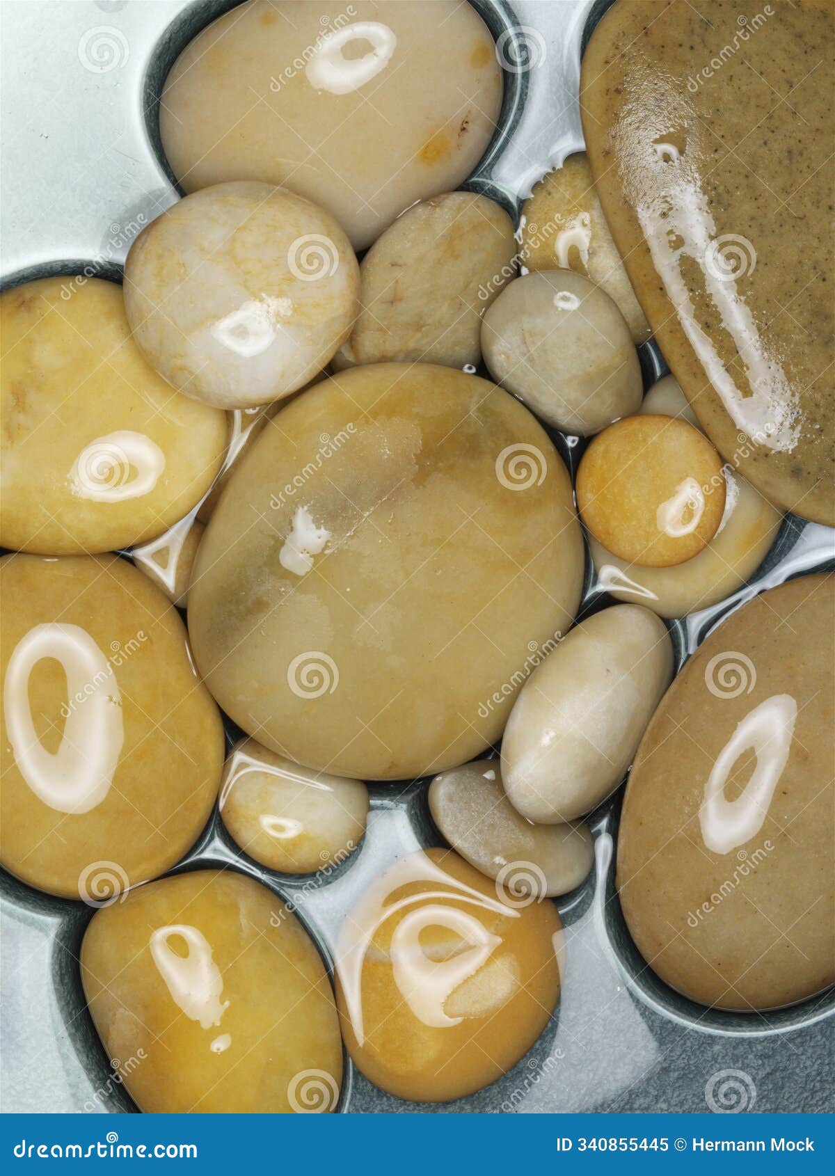 Stones in floating water stock image. Image of glass - 340855445