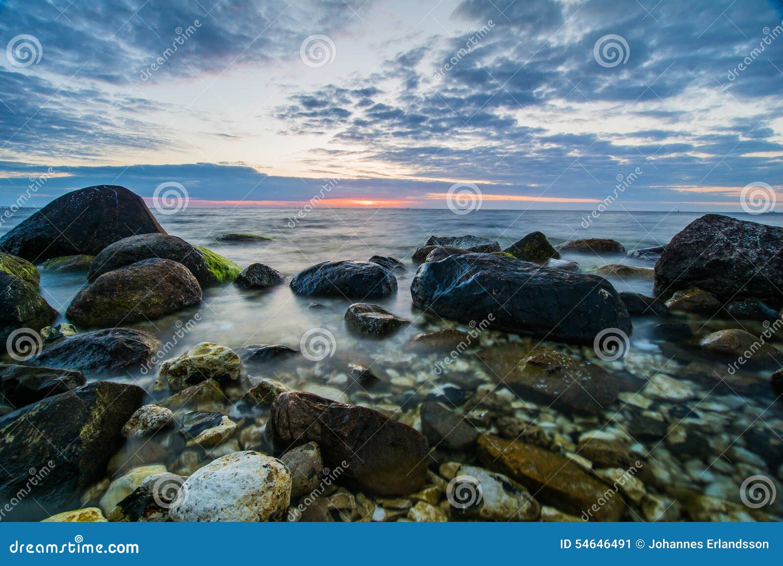 Stones in the Ocean stock image. Image of water, blue - 54646491