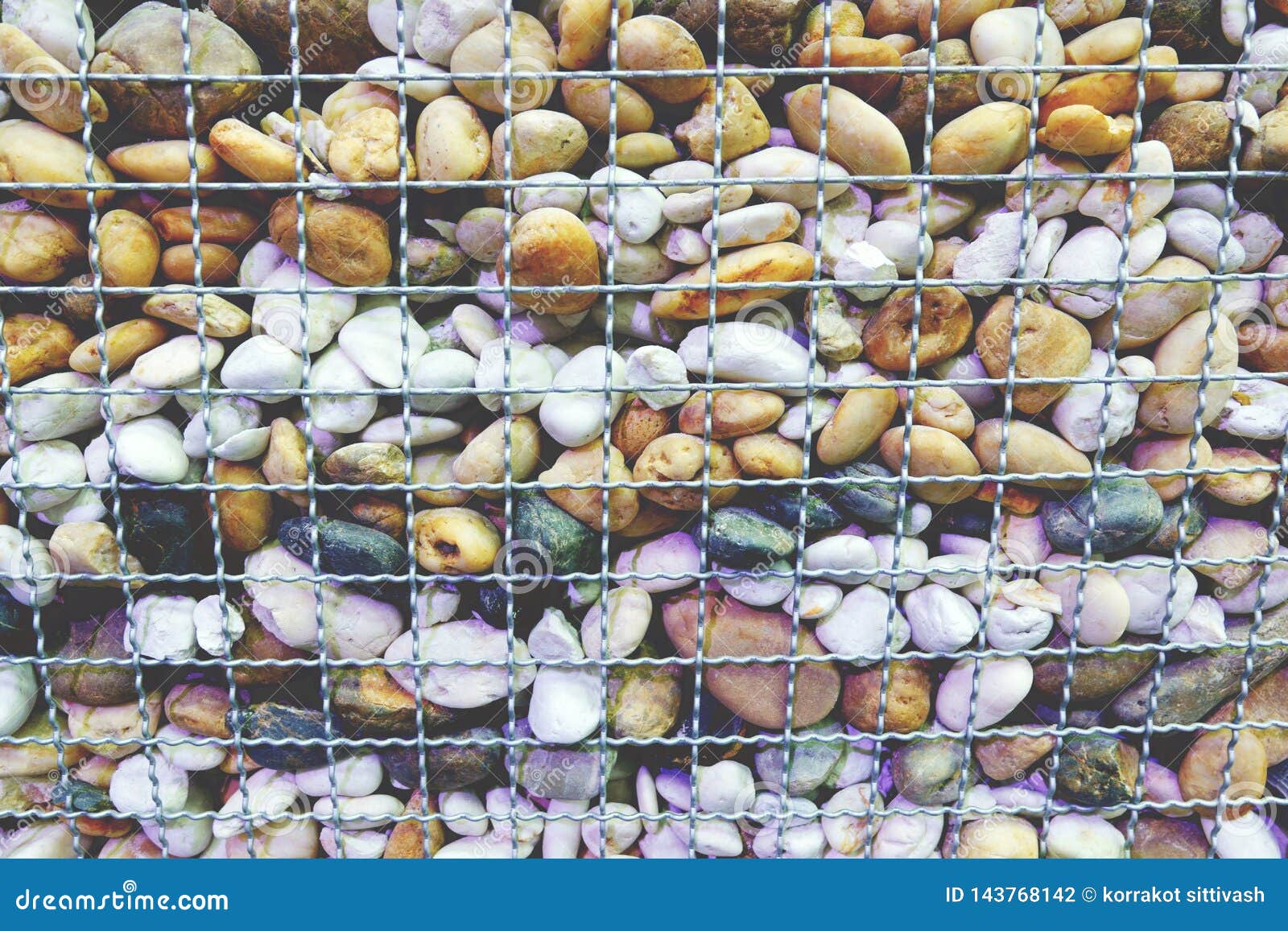 Stones and Pebbles Wall in Wire Mesh Stock Photo - Image of design ...