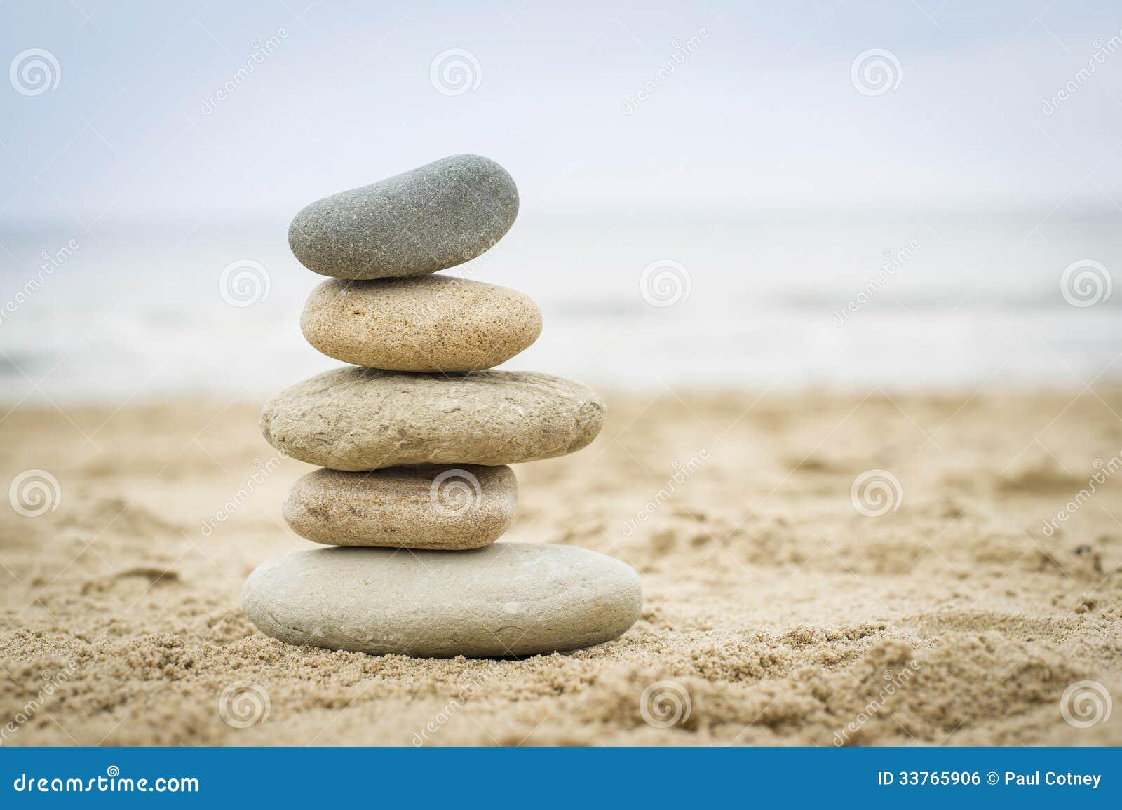Stones Piled Up on a Sand Beach Stock Photo - Image of natural, peace ...