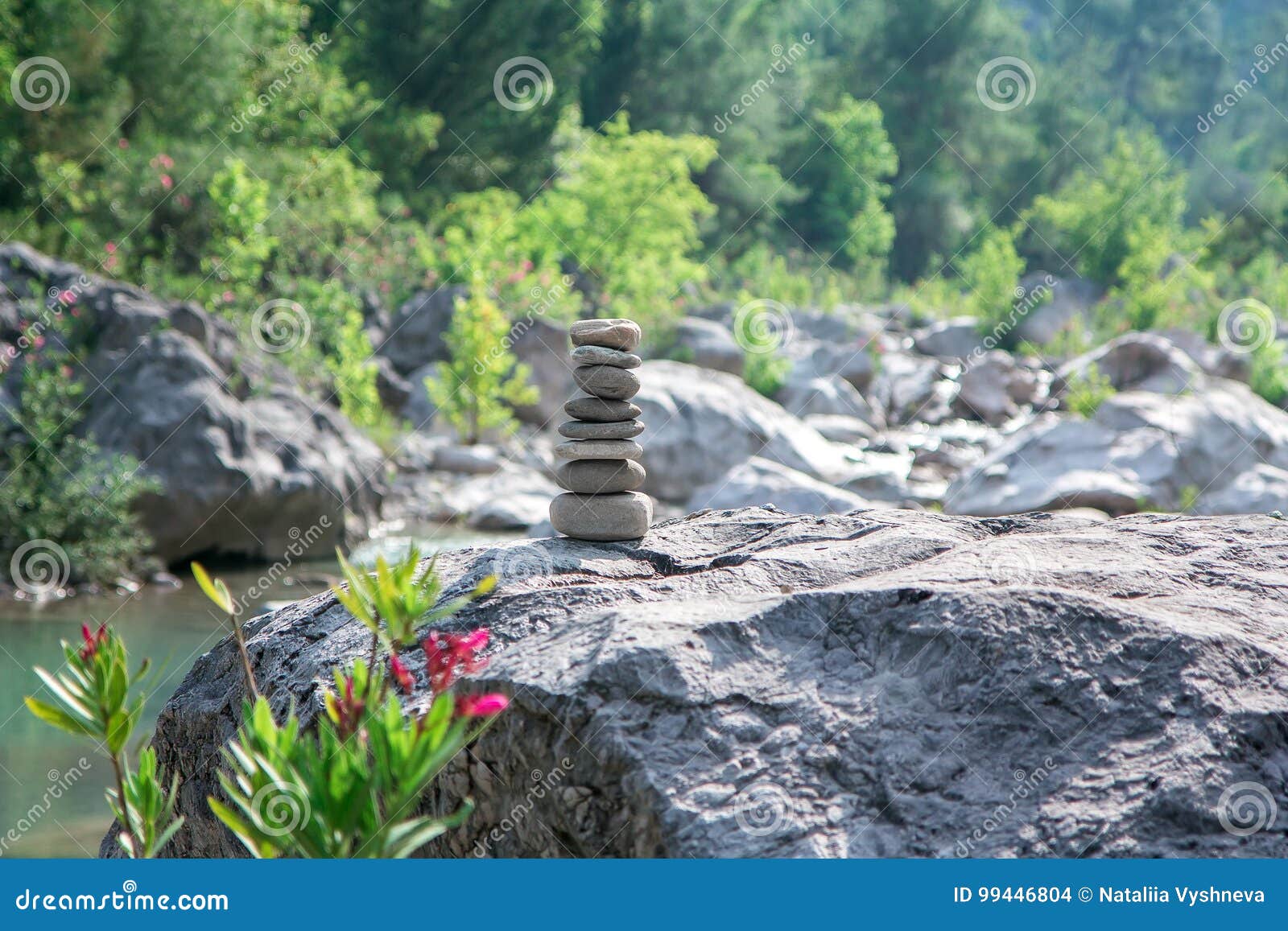 Stones Pyramid on Rock Symbolizing Stability, Zen, Harmony. Stock Photo ...