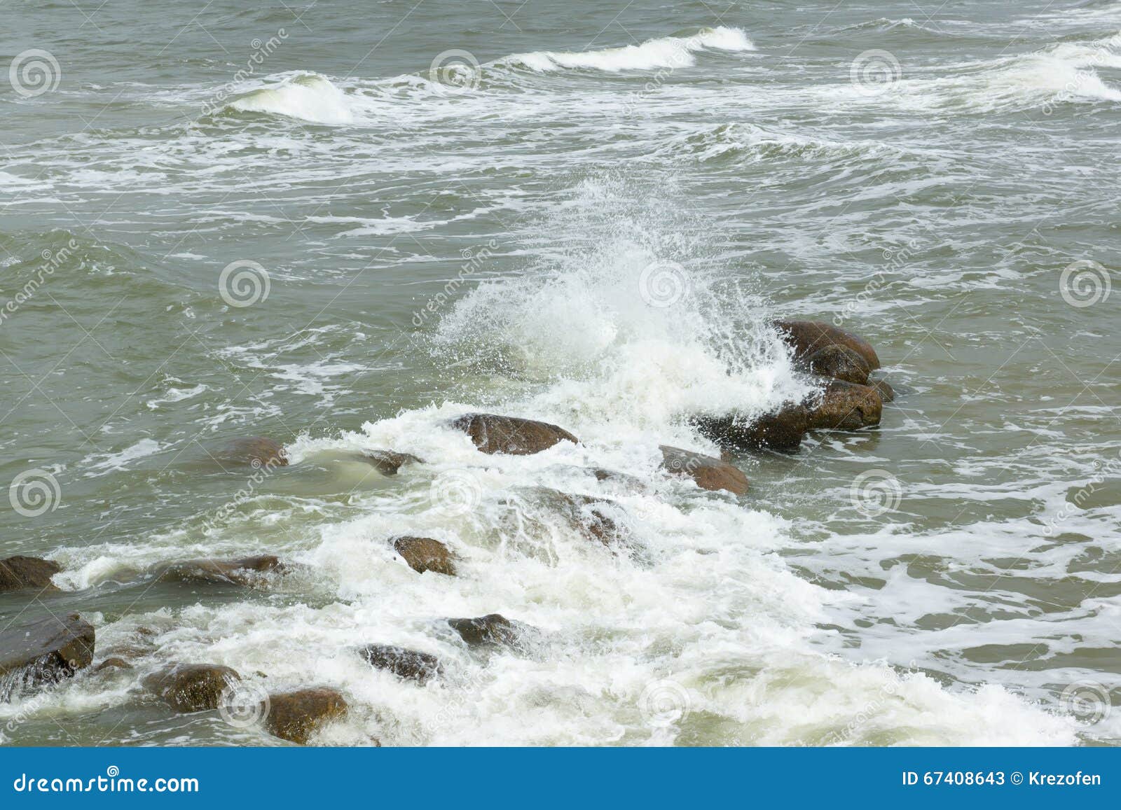 Stones in a raging sea stock image. Image of action, outdoors - 67408643