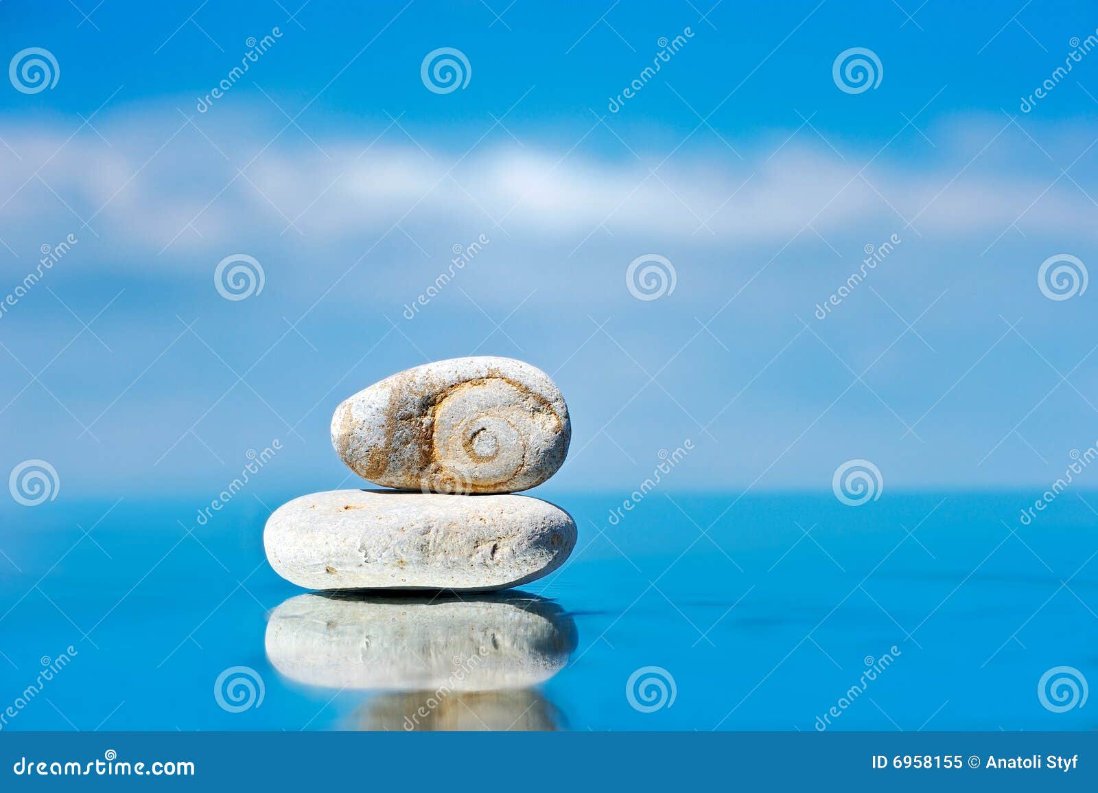 Stones reflected in water stock image. Image of blue, rock - 6958155