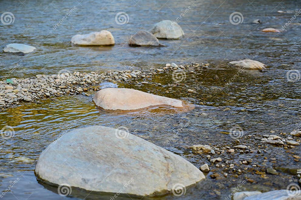 Stones in the river water stock image. Image of path - 238171177